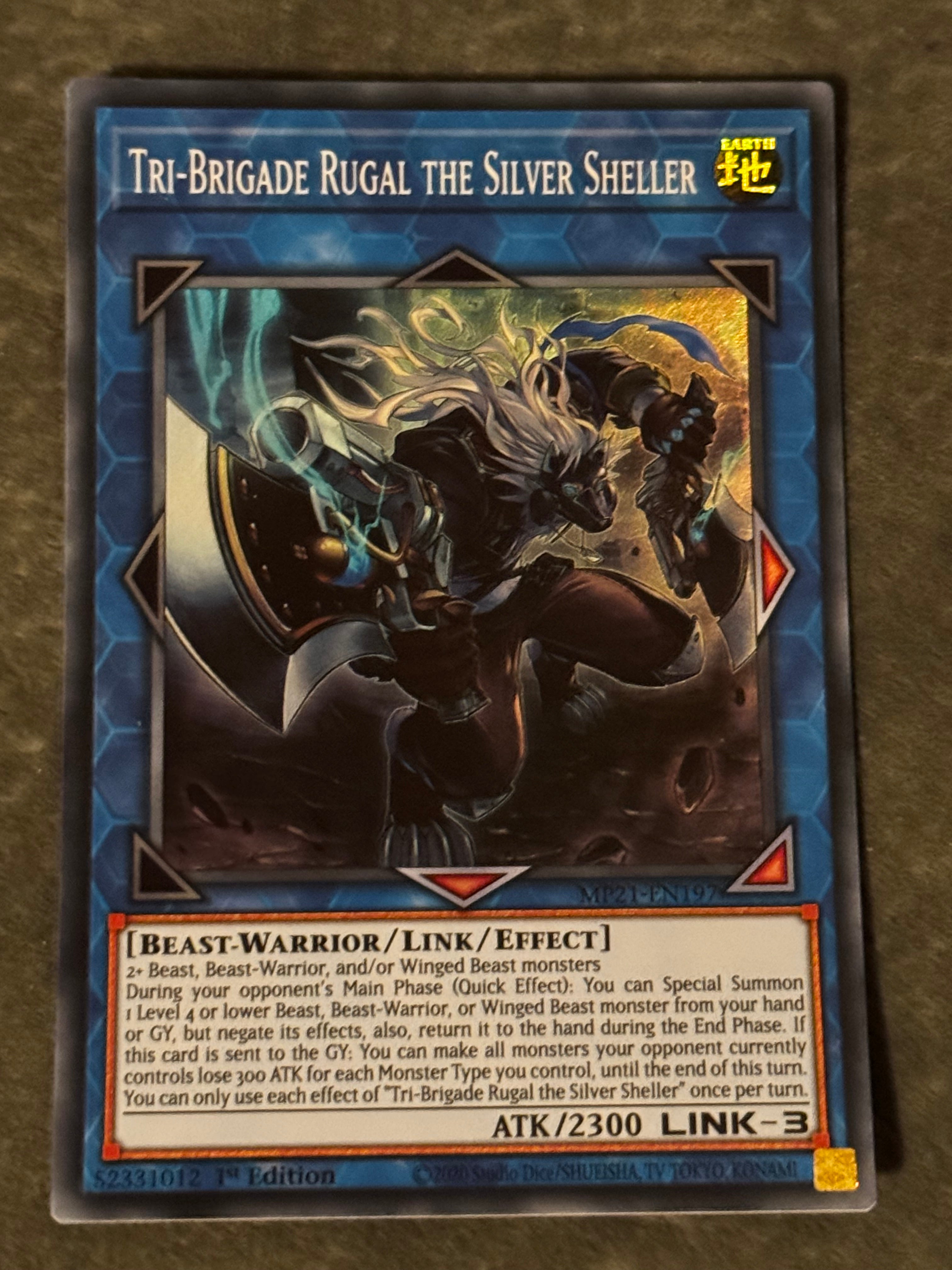 Tri-Brigade Rugal The Silver Sheller MP21-EN197 – Genesis TCG