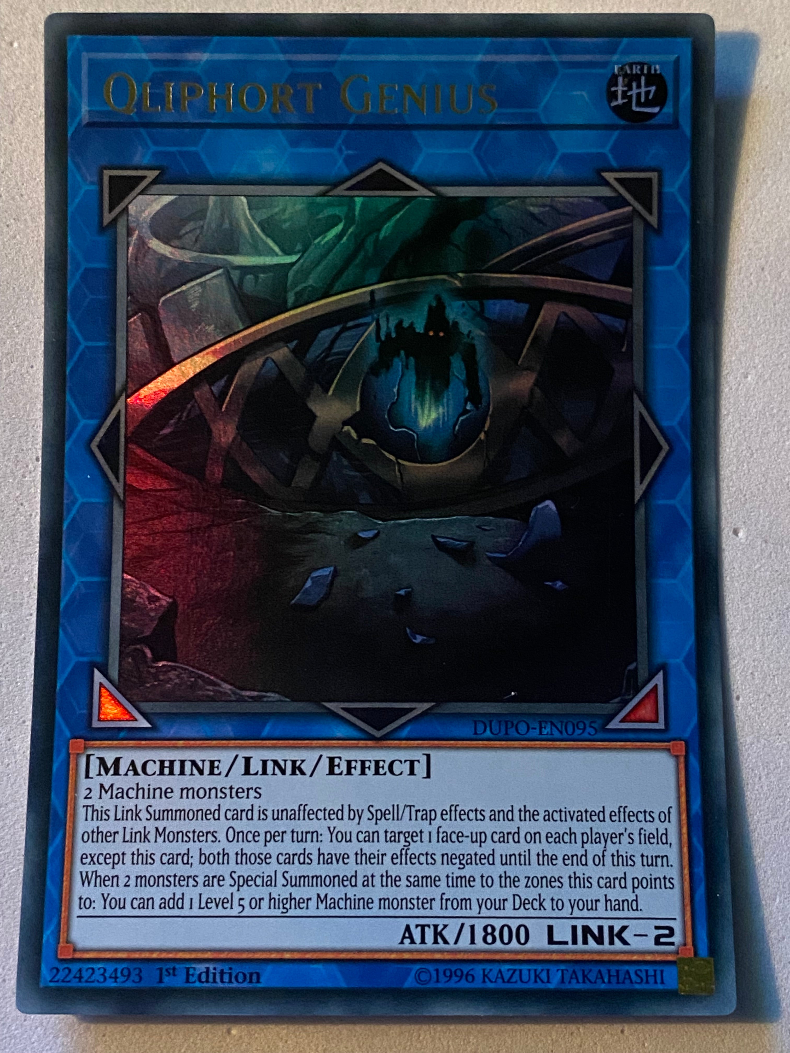 Qliphort Genius DUPO-EN095 – Genesis TCG